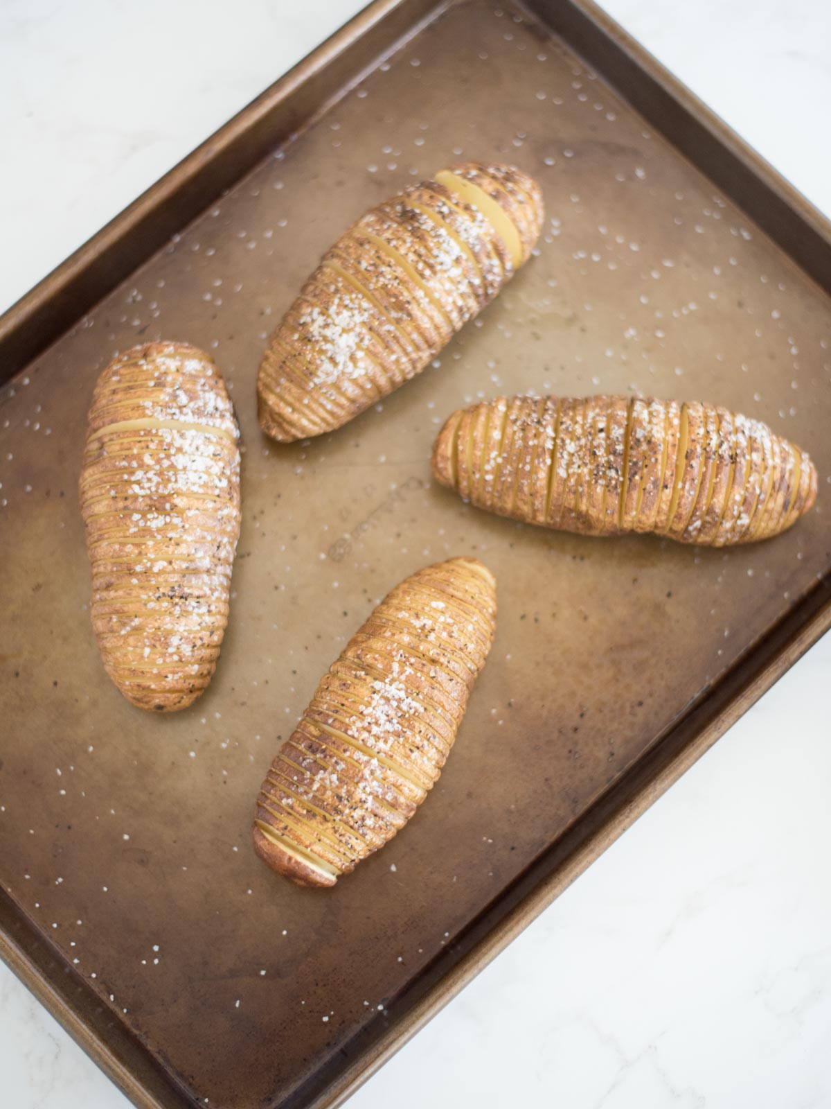 Easy Garlic Hasselback Potatoes Recipe - Sweetly Splendid